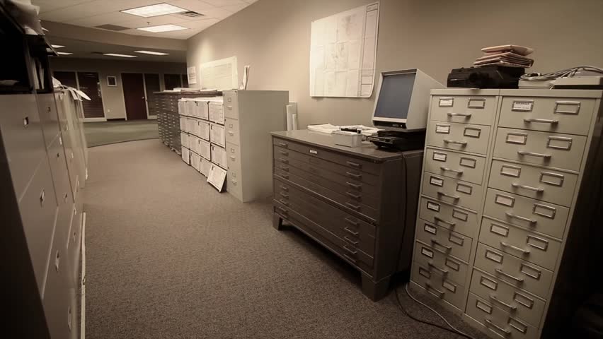 man searches through large filing cabinets Stock Footage Video (100% ...