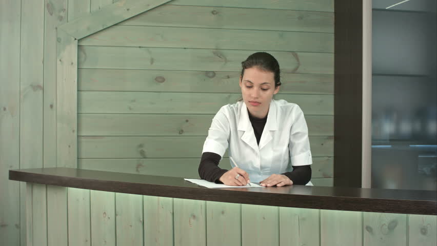 Smiling Spa Receptionist Greeting a Stock Footage Video (100% Royalty ...