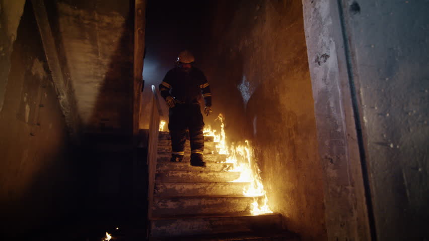 two brave firefighters go burning stairs Stock Footage Video (100% ...