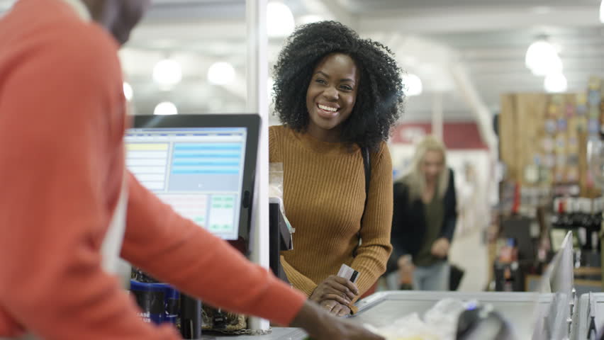 4k Friendly Cashier Taking Payment Customer Stock Footage Video (100% ...