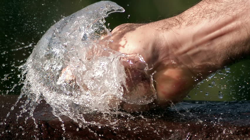 exploding water balloon after squeeze two Stock Footage Video (100% ...