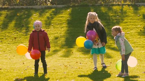 Three Little Happy Girls Throwing Their Stock Footage Video (100% ...