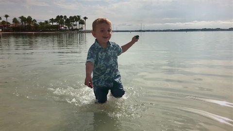 Child Run Down Beach Slow Motion Stock Footage Video (100% Royalty-free ...