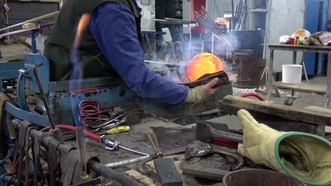 Glassblowing Workshop Showing Glassblower Gaffer Spinning Stock Footage ...