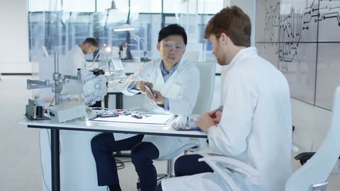 4k Electronics Engineers Working Lab Building Stock Footage Video (100% ...
