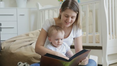 Cute Baby Boy Watching Photo Album Stock Footage Video (100% Royalty ...