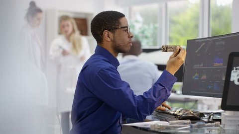 4k Portrait Smiling Engineer Researching Analyzing Stock Footage Video ...