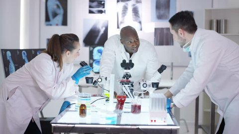 4k Happy Medical Research Team Make Stock Footage Video (100% Royalty ...
