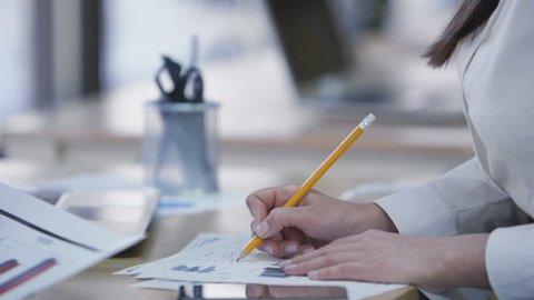 Female Team Leader Checking Documents Making Stock Footage Video (100% ...