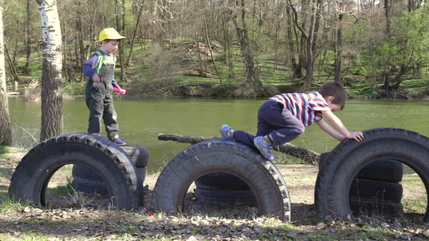 two kids playing together - jumping Stock Footage Video (100% Royalty ...