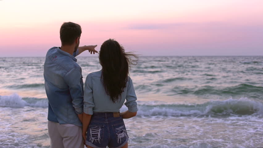 Back View of Cuddling Couple Stock Footage Video (100% Royalty-free ...