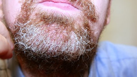 341 Scratch his beard Stock Video Footage - 4K and HD Video Clips ...