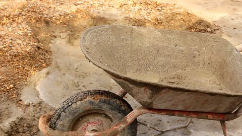 Scoop Cement Mortar Into Wheelbarrow Footage Stock Footage Video (100% ...