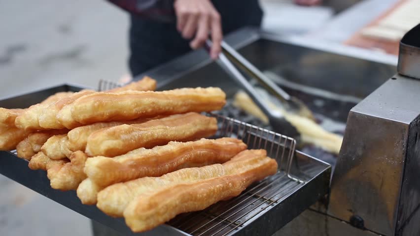 making frying bread sticks Stock Footage Video (100% Royalty-free ...