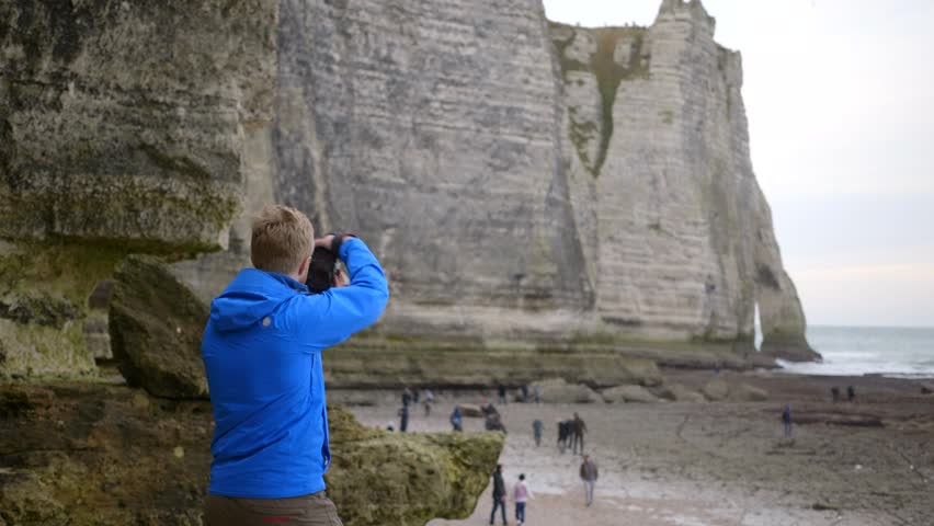 young-man-photographer-sitting-on-steps image - Free stock photo ...