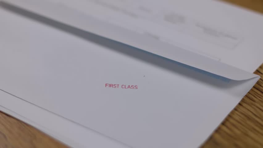 first class stamp on envelope Stock Footage Video (100% Royalty-free ...