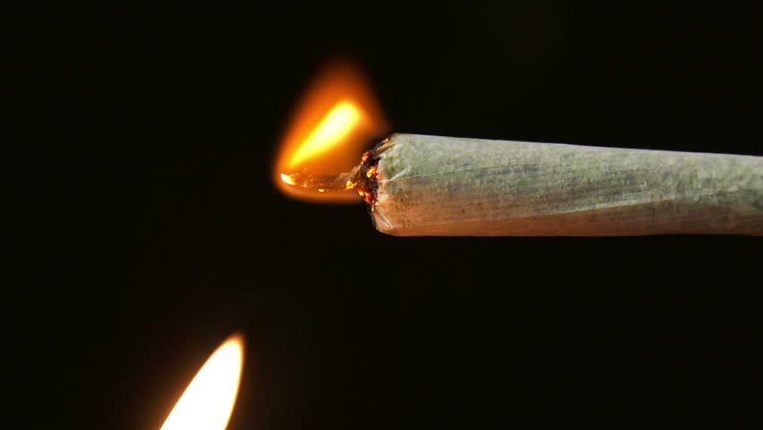 marijuana joint cigarette being lit closeup Stock Footage Video (100% ...