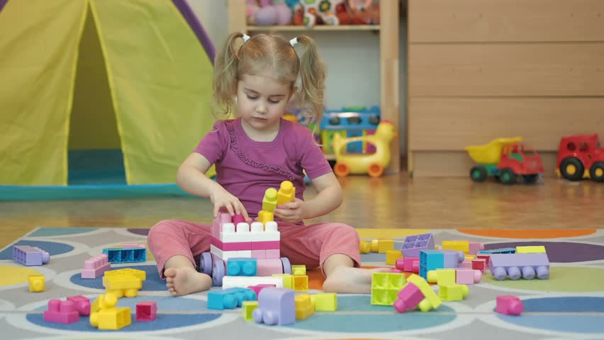 little girl build toy children Stock Footage Video (100% Royalty-free ...