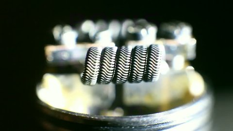 Burning Alien Coil Build On Vaping Stock Footage Video (100% Royalty ...