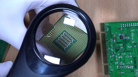 Hand Magnifying Glass Examining Computer Cpu Stock Footage Video (100% ...