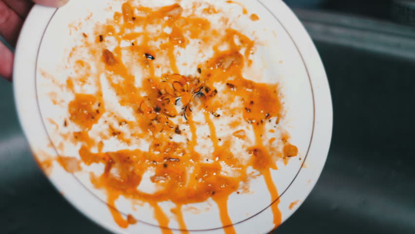 woman washes dirty plate covered grease Stock Footage Video (100% ...