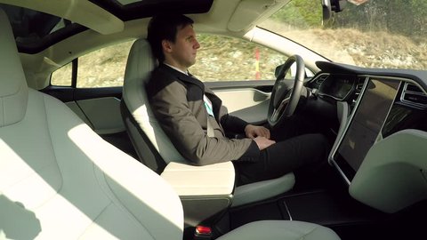 Side View Image Woman Sitting Tesla Stock Footage Video (100% Royalty ...