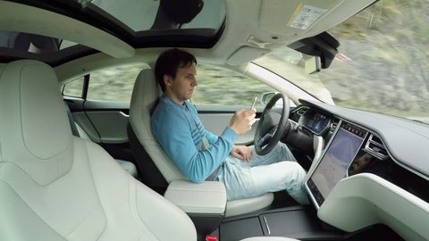 male driver sleeping behind self-driving steering Stock Footage Video ...