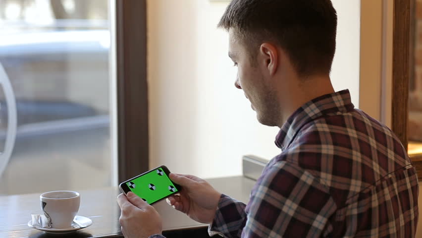 man playing game on mobile cell Stock Footage Video (100% Royalty-free ...