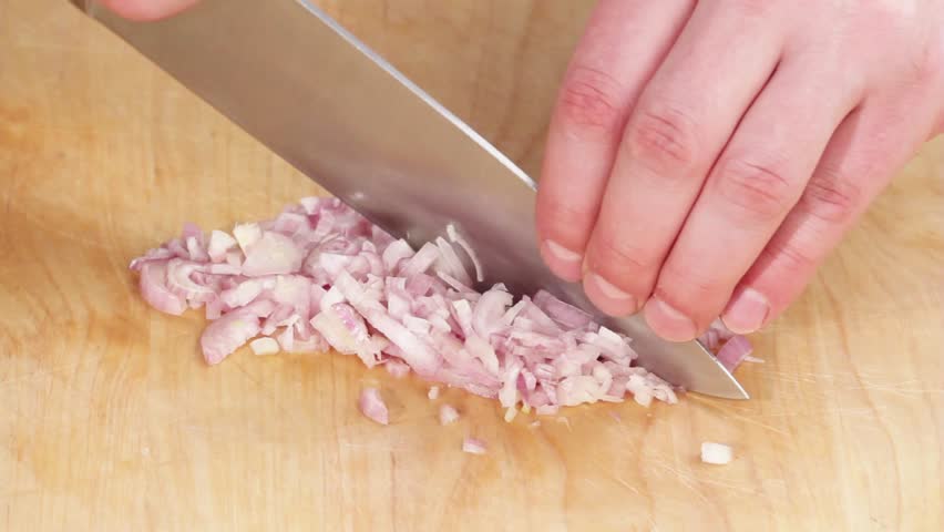 shallots being finely chopped Stock Footage Video (100% Royalty-free ...