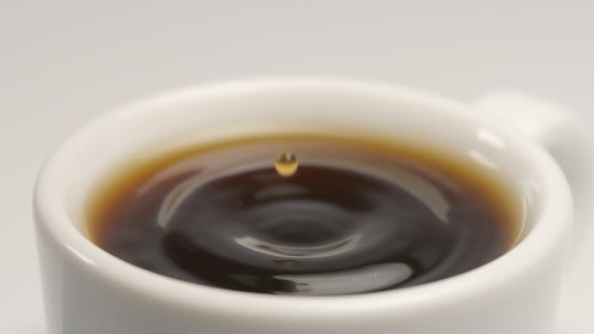 Slow Motion: Coffee Drop Falls Stock Footage Video (100% Royalty-free ...
