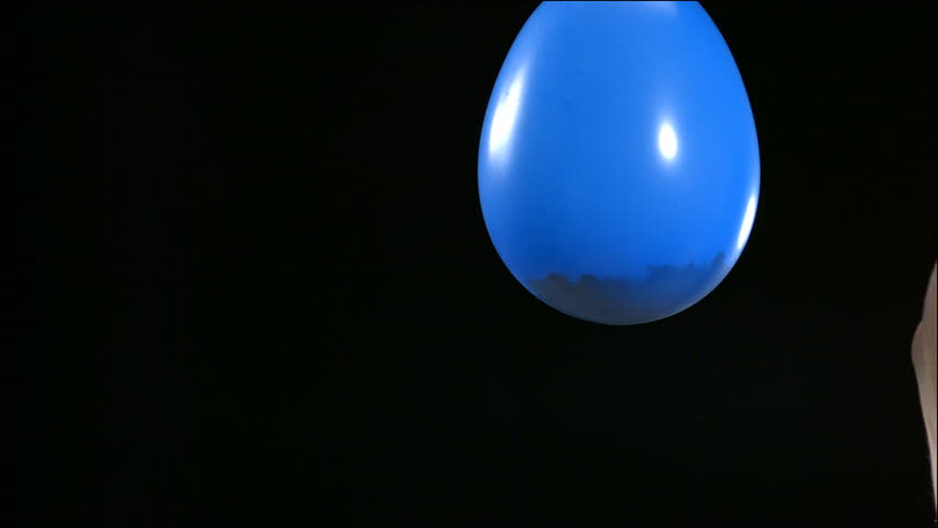 Man Popping Blue Balloon Filled Stock Footage Video (100% Royalty-free ...