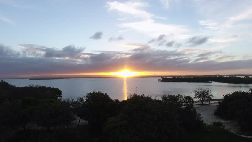 sunset over water island Stock Footage Video (100% Royalty-free ...