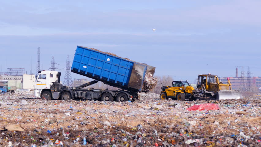 4k truck offloading waste into huge Stock Footage Video (100% Royalty ...