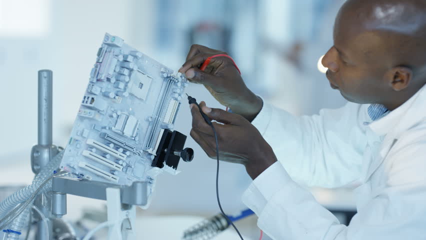 4k Engineer Working in Electronics Stock Footage Video (100% Royalty ...
