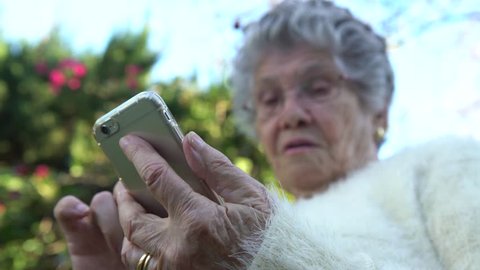4k Grandmother Internet Surfing On Smart Stock Footage Video (100% ...