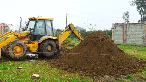Yellow Tractor Digging Hole Stock Footage Video (100% Royalty-free ...