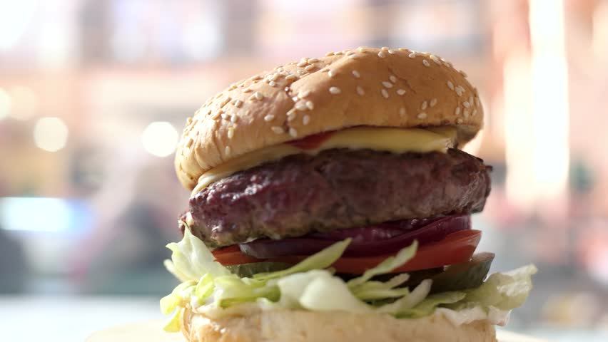 fresh cheeseburger rotating beef cheese vegetables Stock Footage Video ...