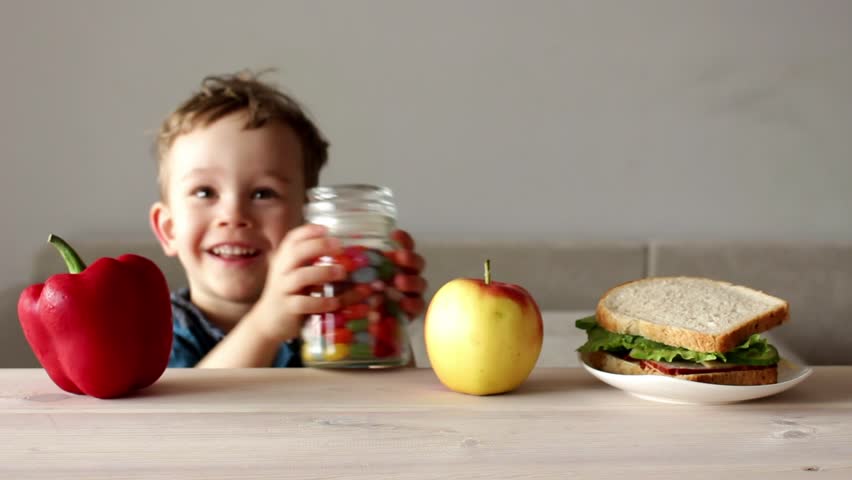 cute little boy choose candy Stock Footage Video (100% Royalty-free ...