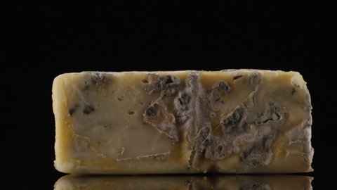Blue Cheese Spinning On Black Background Stock Footage Video (100% ...