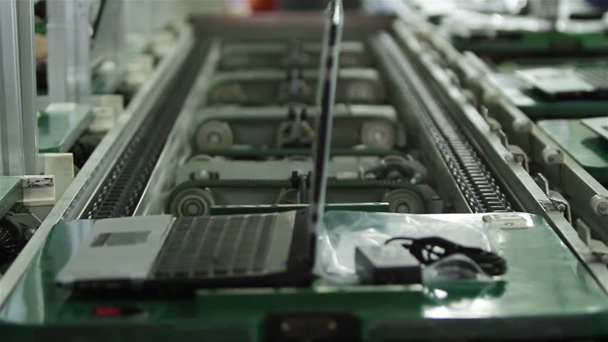 laptops computer moving along on conveyor Stock Footage Video (100% ...