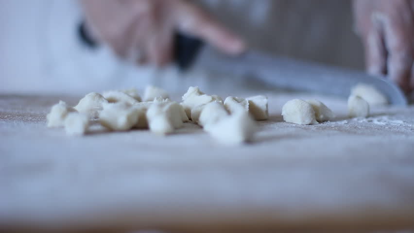 female chef's hands make potato nyoki Stock Footage Video (100% Royalty ...