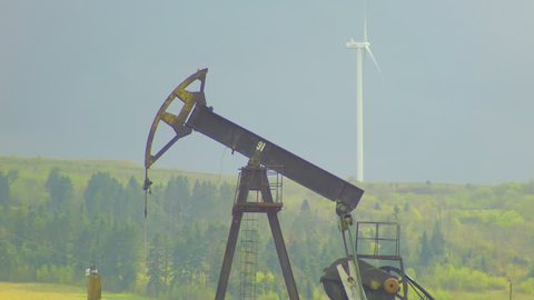 Oil Well Pumpjack Wind Power Plant Stock Footage Video (100% Royalty ...
