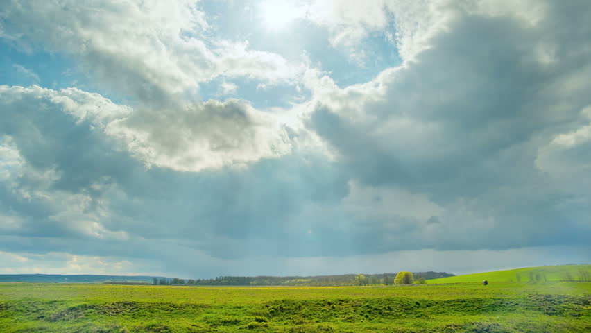 green field dramatic sky time-lapse Stock Footage Video (100% Royalty ...