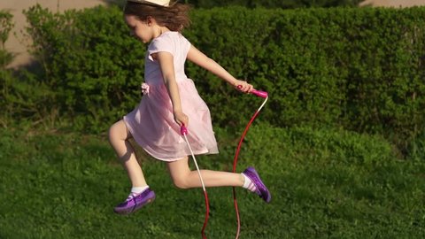 Girl Pink Dress Jumping Rope On Stock Footage Video (100% Royalty-free ...