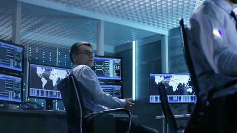 Team Technical Moderators Have Discussion Monitoring Stock Footage ...