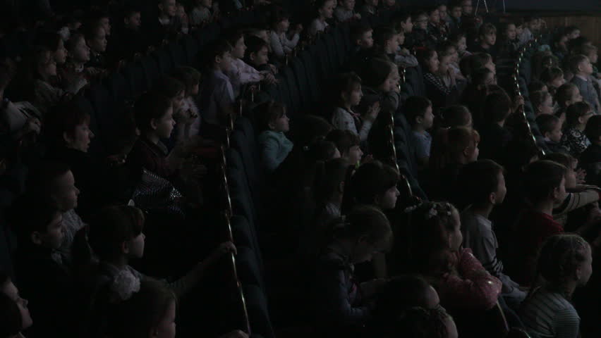 children applauding auditorium during performance theater Stock Footage ...