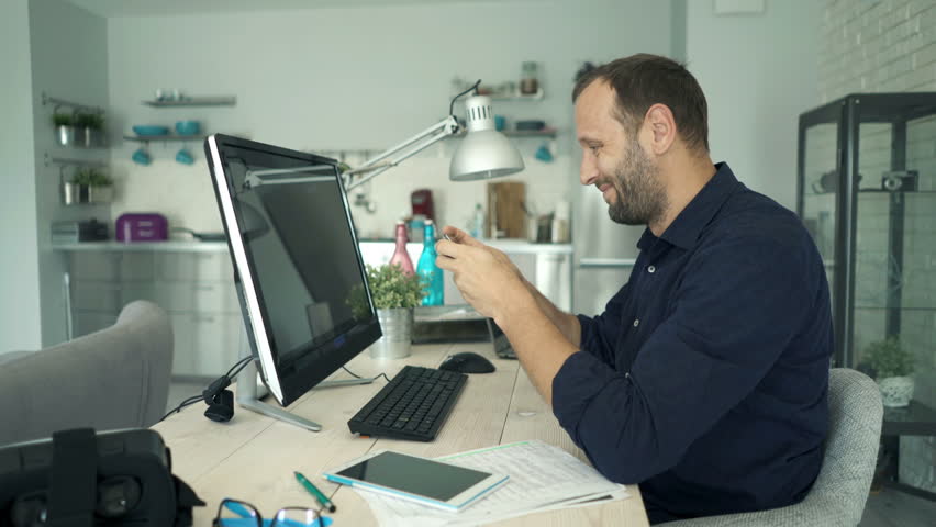 asian scientist sitting his desk doing Stock Footage Video (100% ...