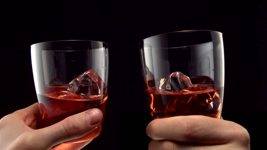 two glasses whiskey toasting shooting high Stock Footage Video (100% ...