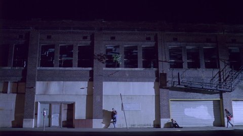 Men Loitering Near Warehouse Night Observing Stock Footage Video (100% ...
