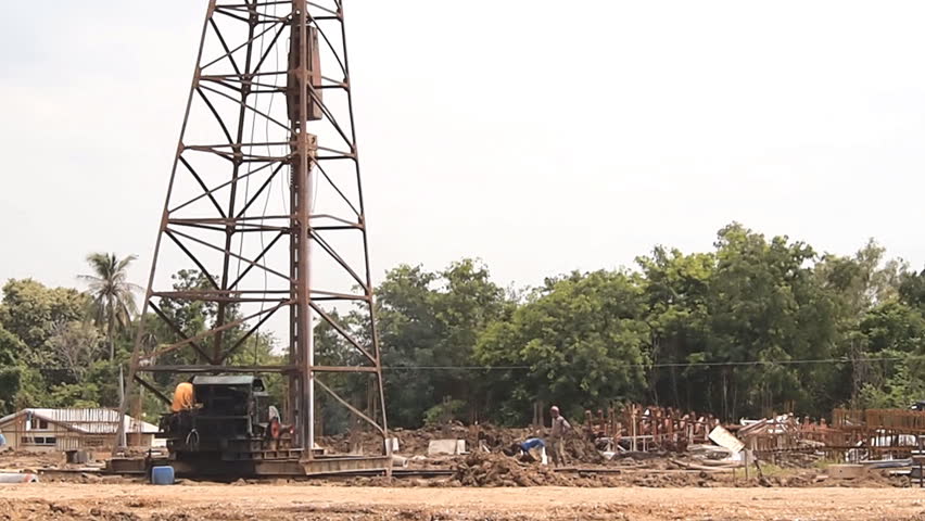 hydraulic ram pile driver driving piles Stock Footage Video (100% ...